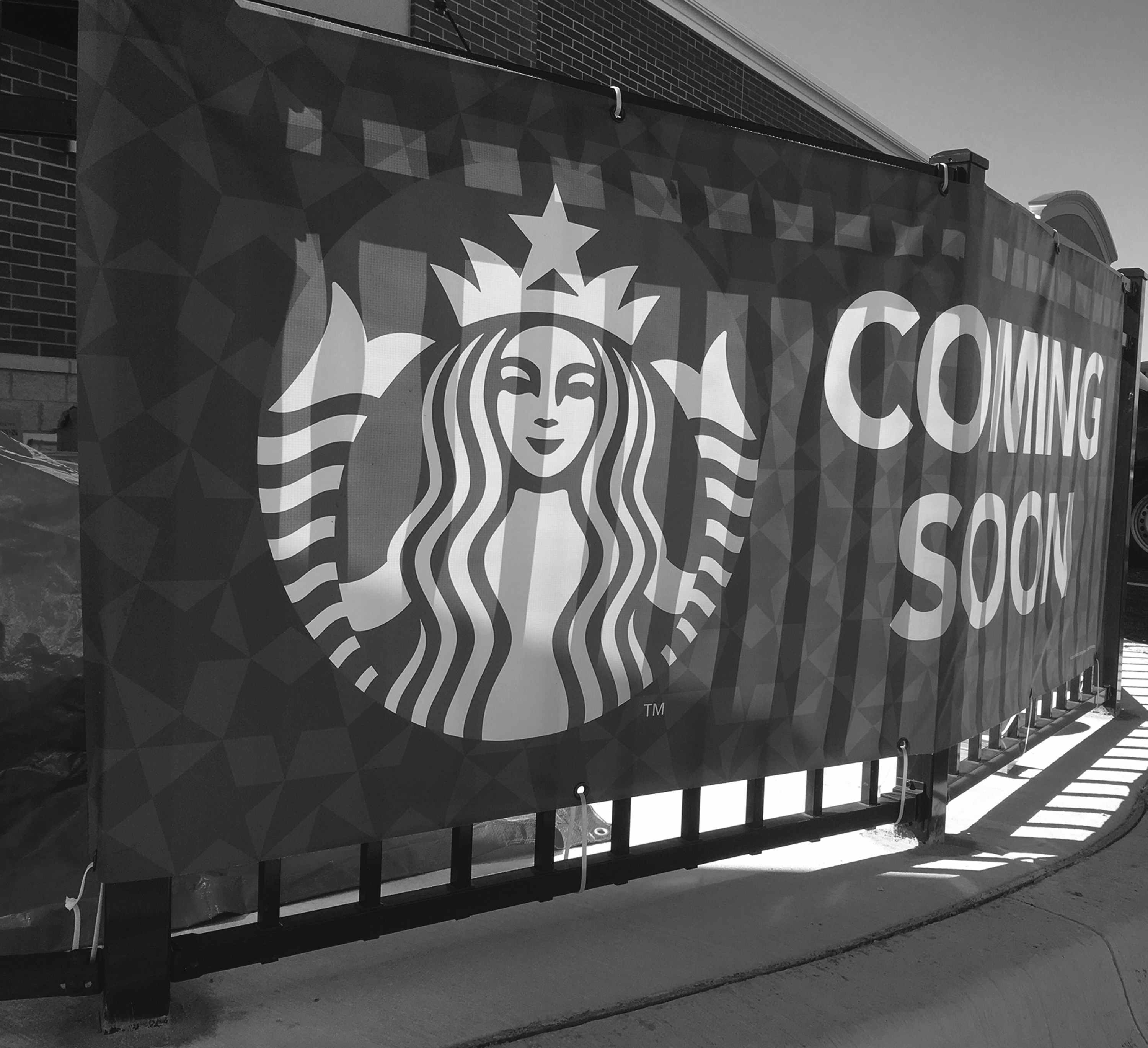 Signs point to new Starbucks opening soon - The Woodstock Independent